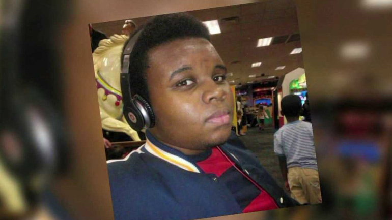 Protesters Gather Outside Ferguson Police Department On Anniversary Of