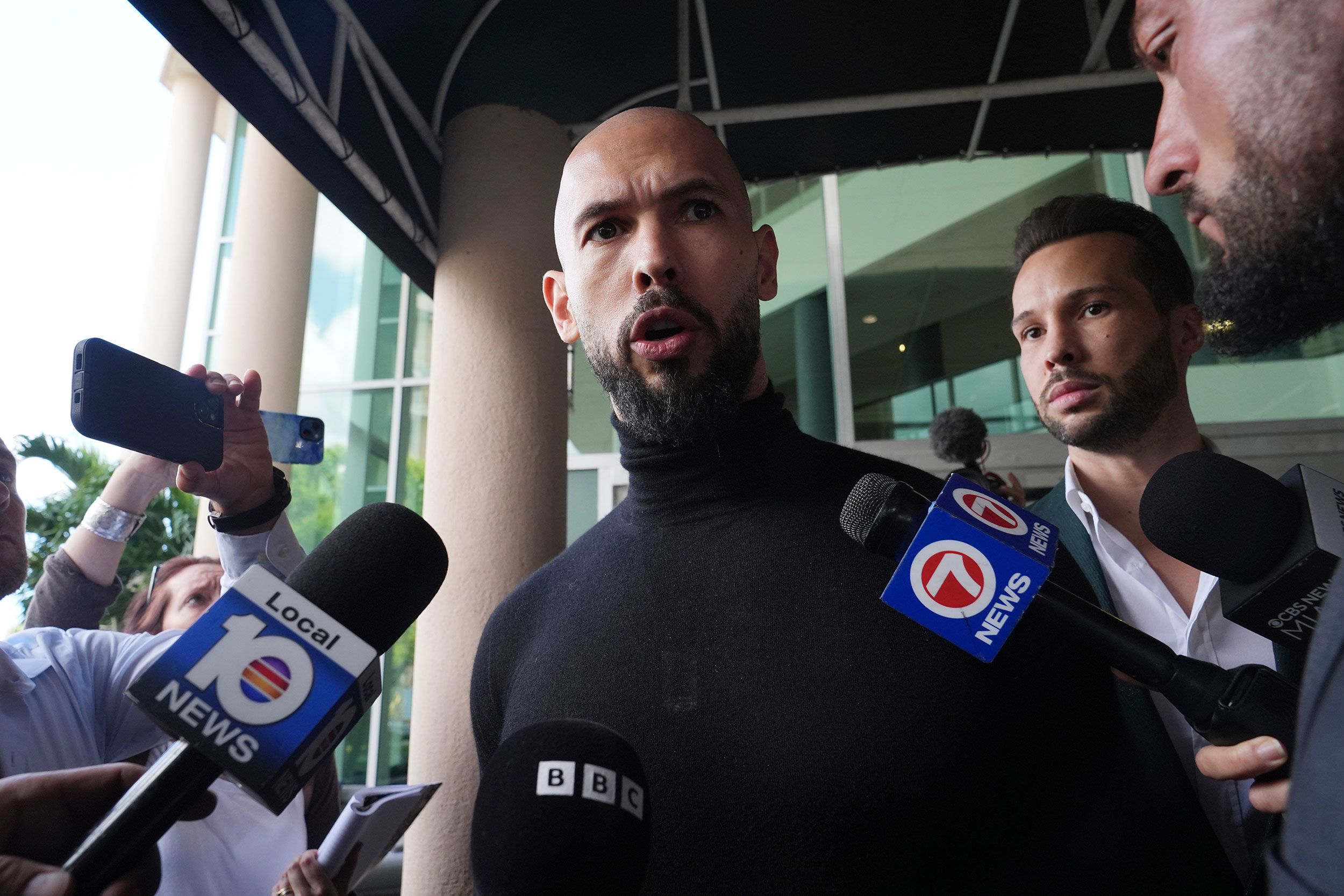 The Tate brothers left Romania and are facing an active criminal ...